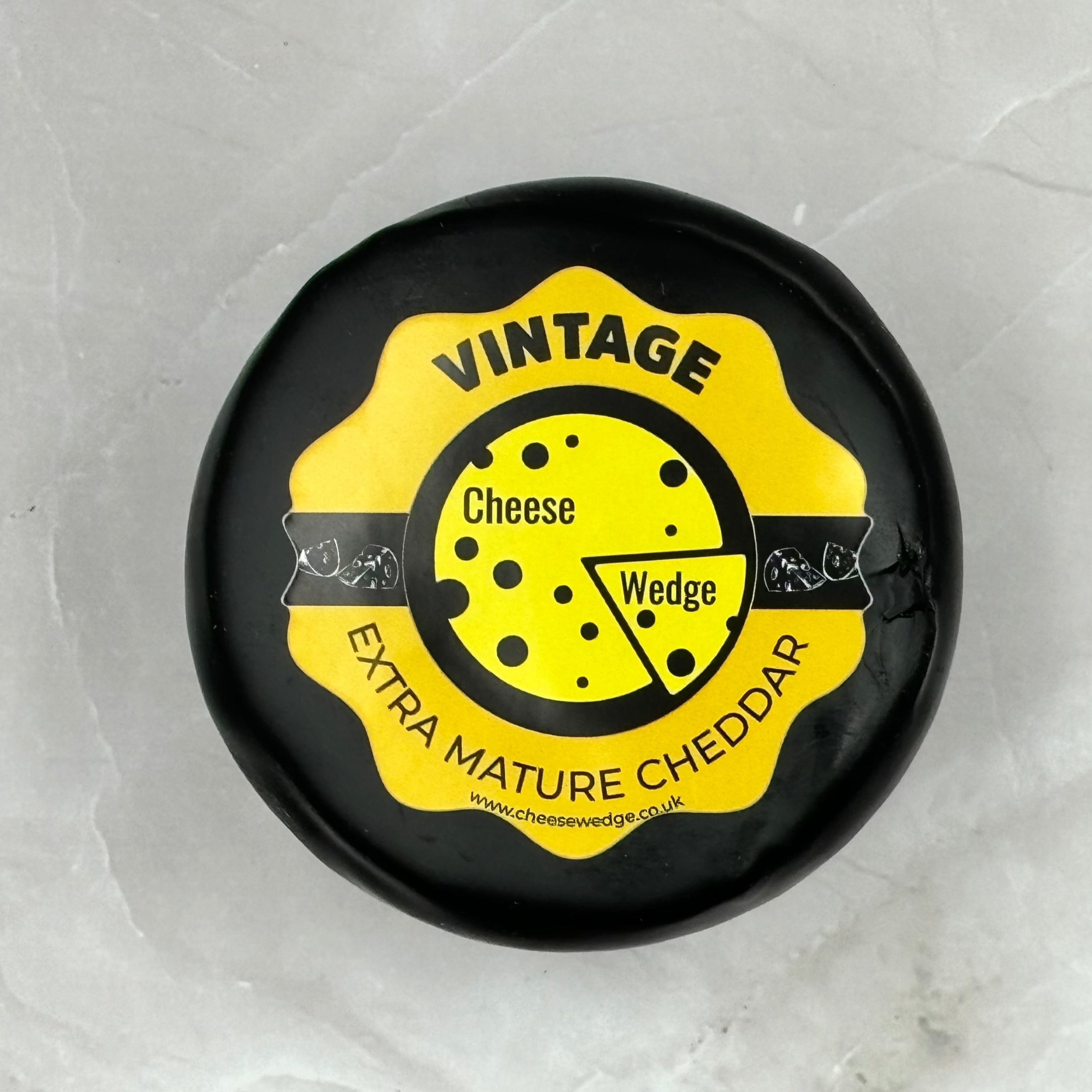 Vintage Cheddar - Waxed Truckle 200g – The Cheese Wedge Company