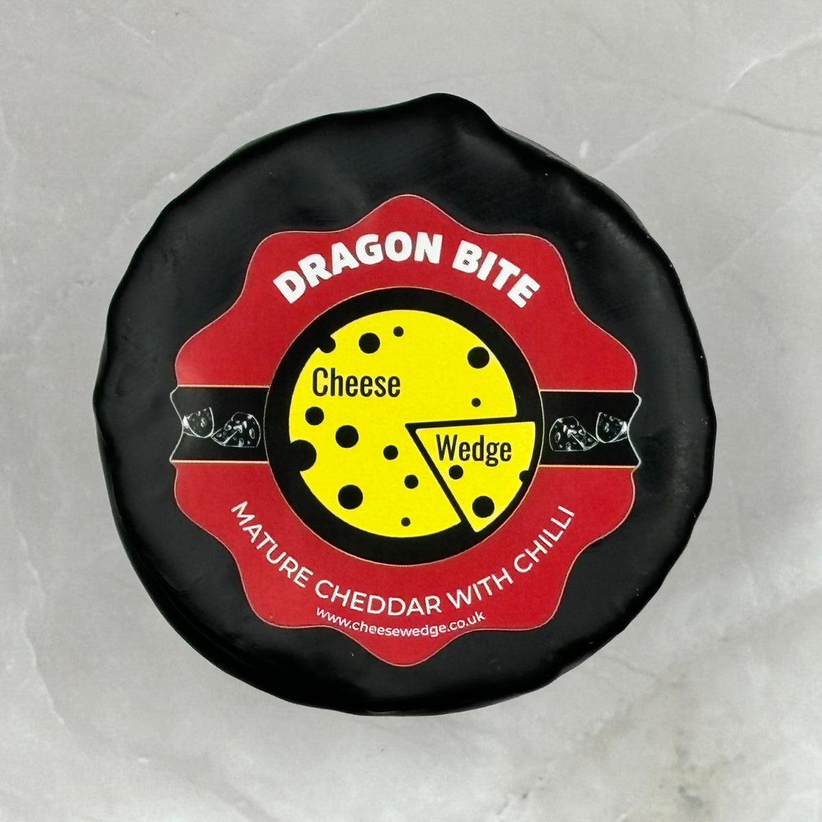 Dragon Bite - Waxed Truckle 200g – The Cheese Wedge Company